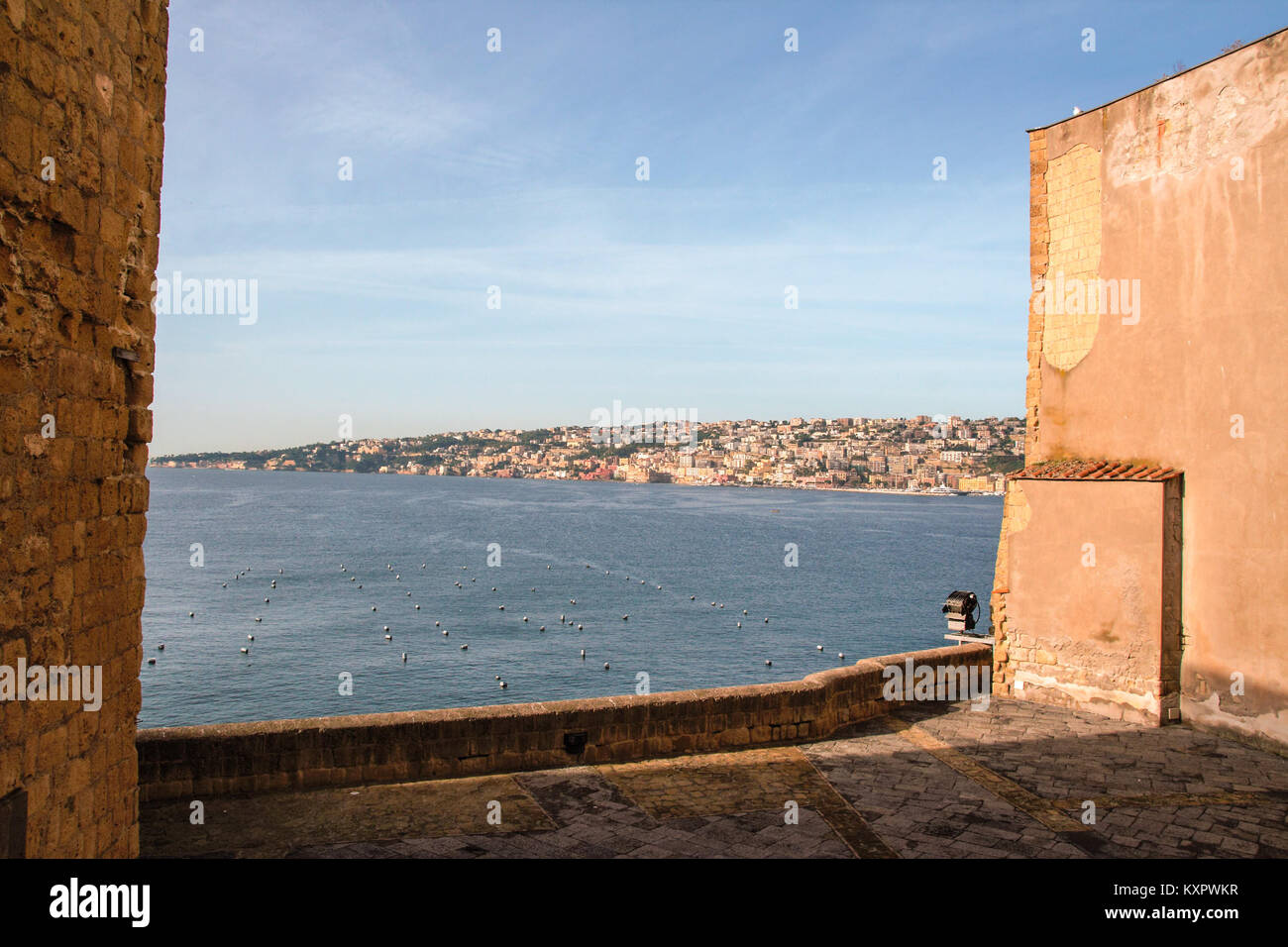 the port of Naples framed by the old wall of Castel dell'Ovo, Naples ...