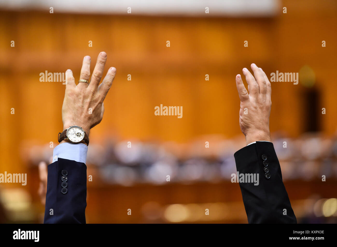 Raised hand in air hi-res stock photography and images - Alamy