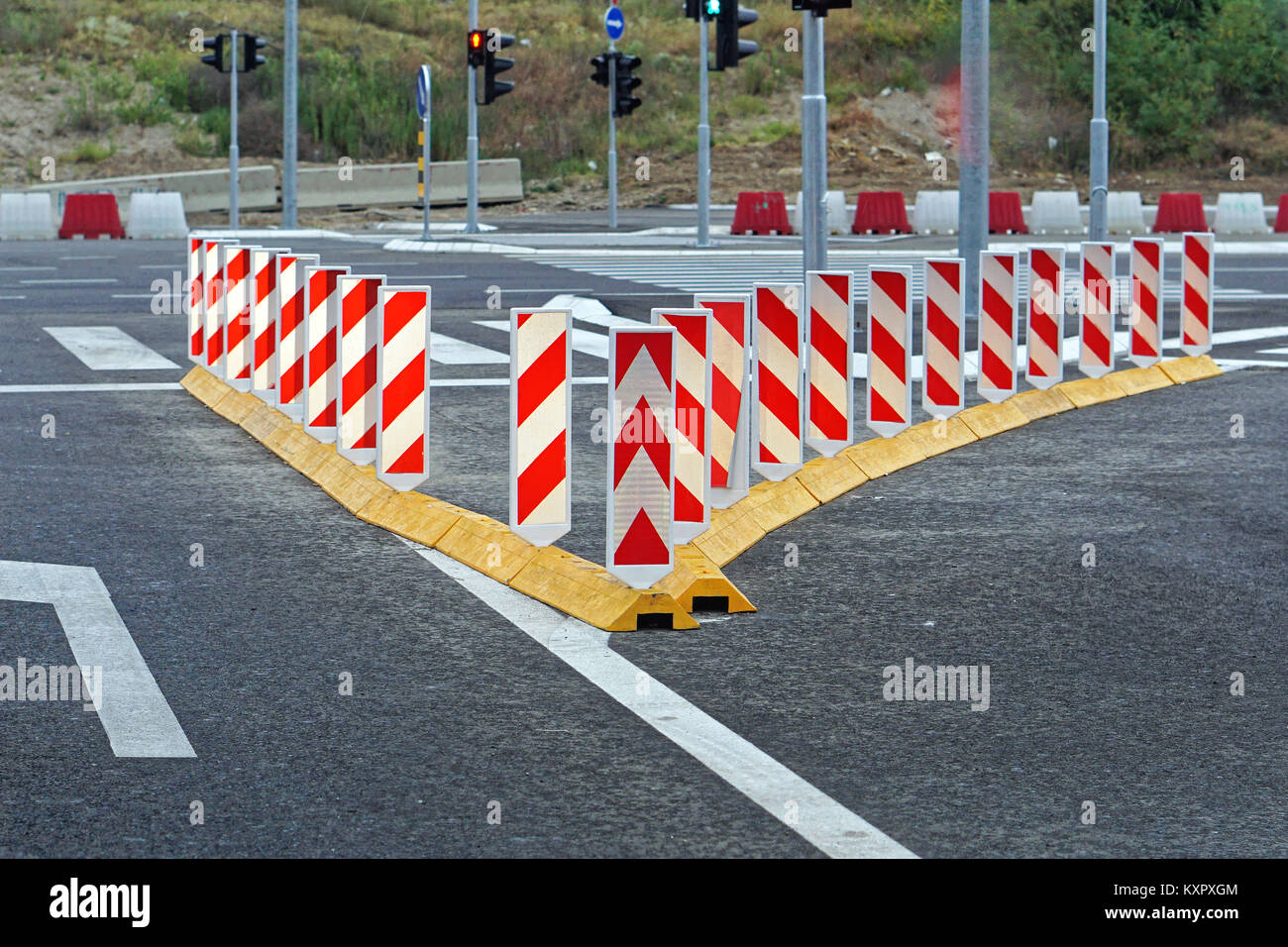 Dividing traffic signs at intersection during road works Stock Photo ...