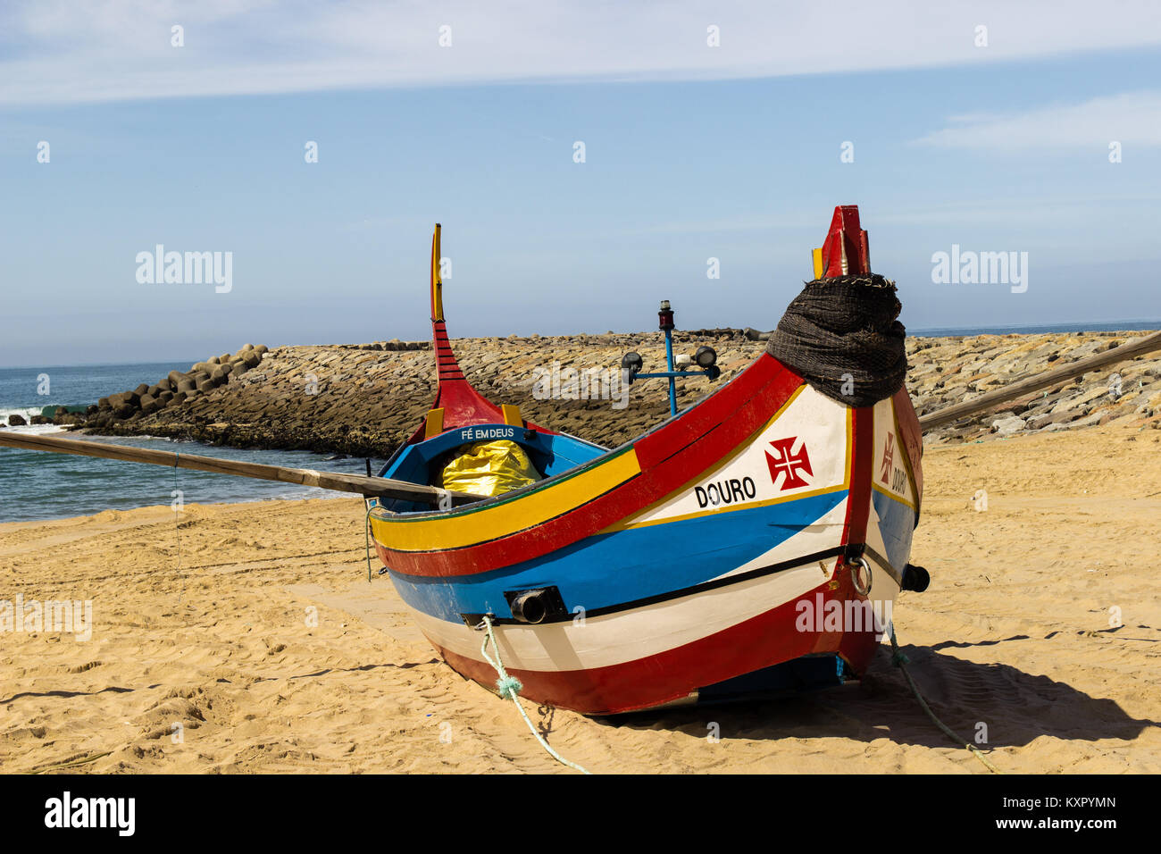 Fishing boats - "Xavega" traditional art Stock Photo - Alamy