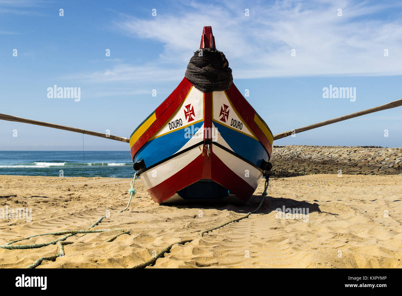 Fishing boats - "Xavega" traditional art Stock Photo - Alamy