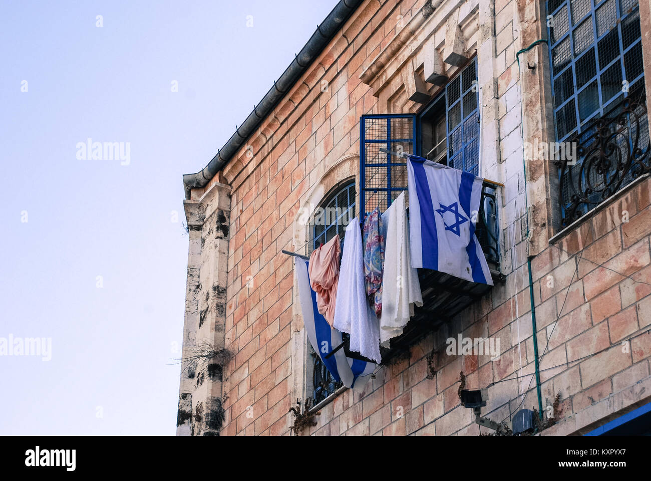 Horizontal picture of traditional jewish house building with flag and ...