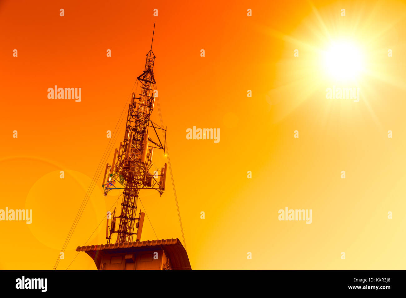 communication tower station with red hot sunset sky Stock Photo - Alamy