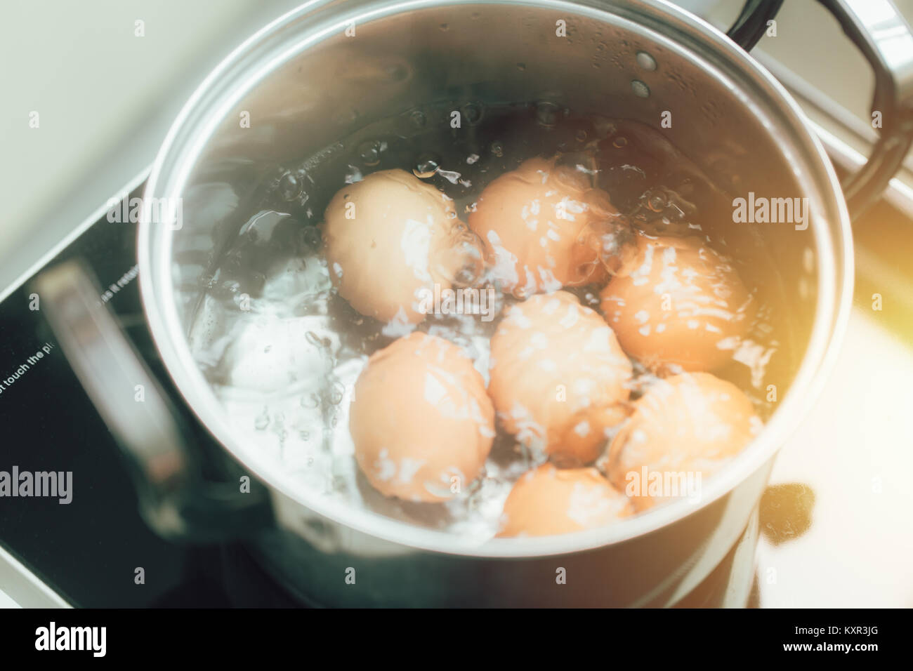 boiling eggs vintage color tone Stock Photo - Alamy