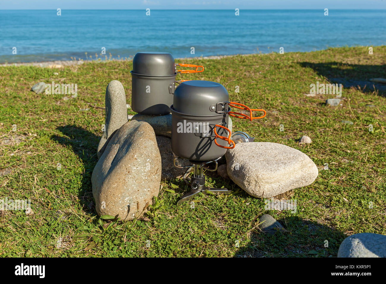Camping cookware. A set of camping dishes for a picnic on the beach ...