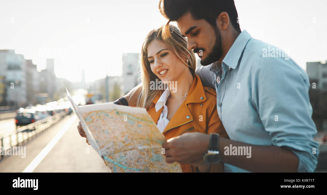Happy tourists traveling and smiling Stock Photo - Alamy