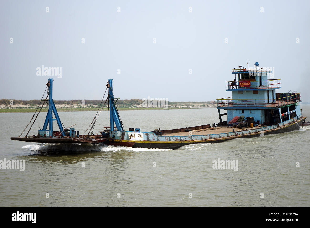 MANDALAY, MYANMAR - CIRCA APRIL 2017 Barge on the Ayerawady river Stock ...