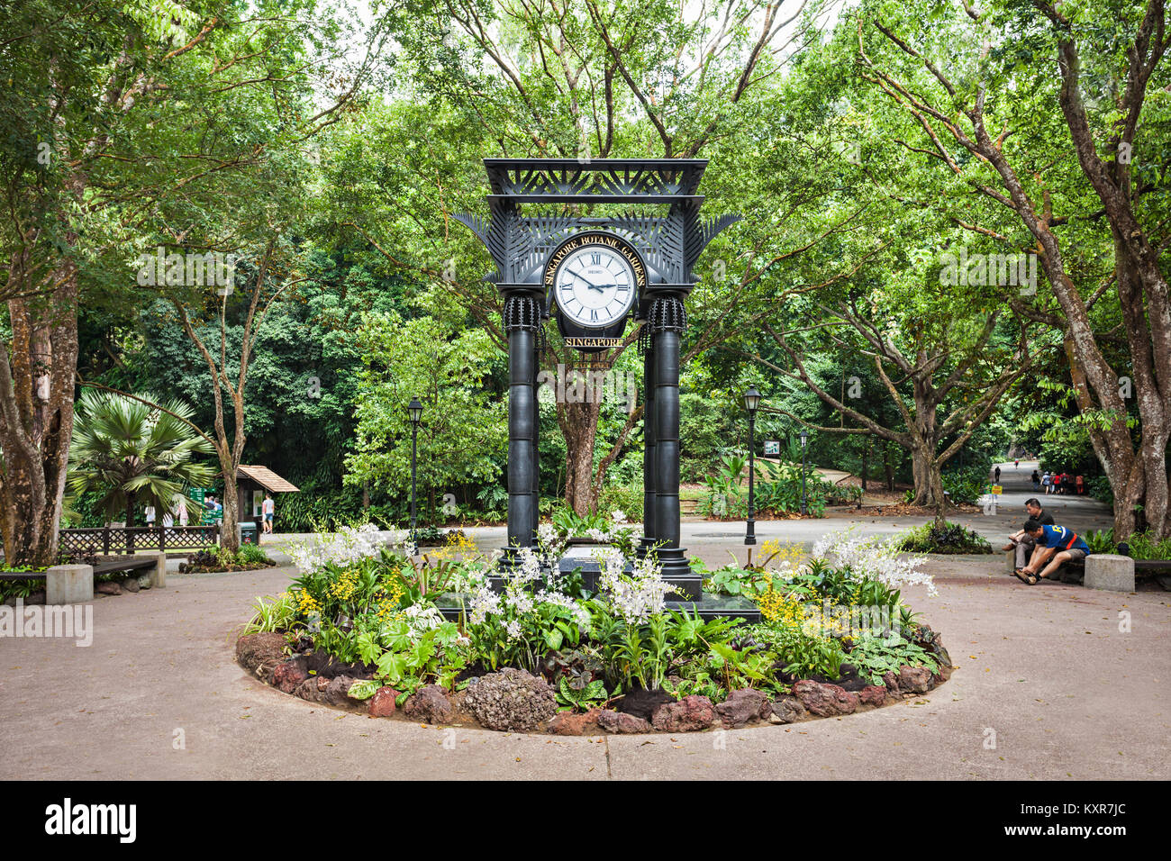 SINGAPORE - OCTOBER 17, 2014: Old Clock in The Singapore Botanic ...
