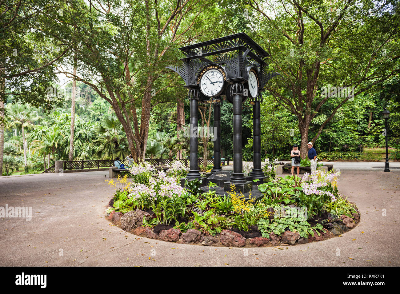 SINGAPORE - OCTOBER 17, 2014: Old Clock in The Singapore Botanic ...