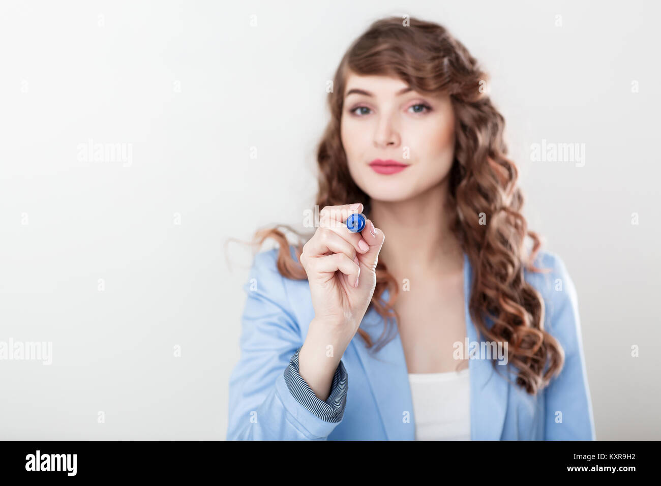 hand of woman writing on screen Stock Photo - Alamy