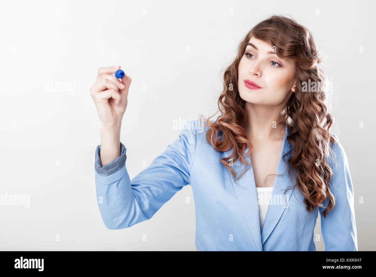 hand of woman writing on screen Stock Photo - Alamy