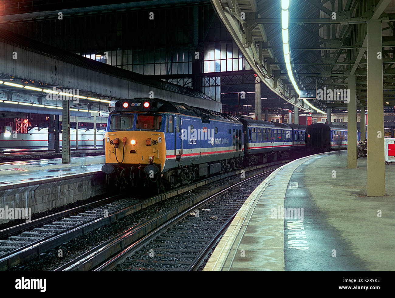 A class 50 diesel locomotive number 50030 'Repulse' waits to depart ...