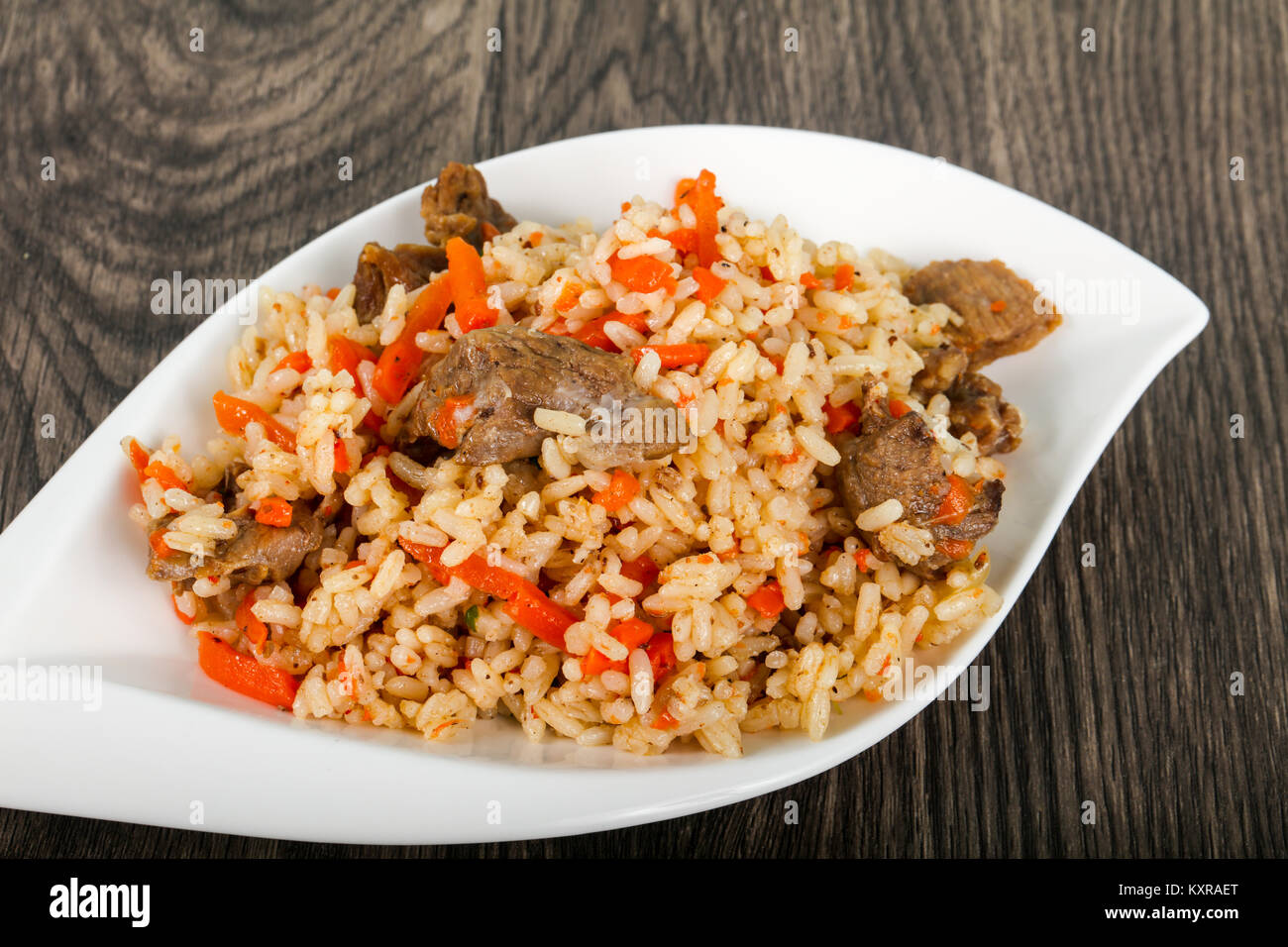 Asian rice - Plov with meat and carrot Stock Photo - Alamy