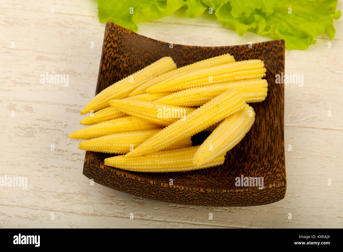Young raw baby corn Stock Photo - Alamy
