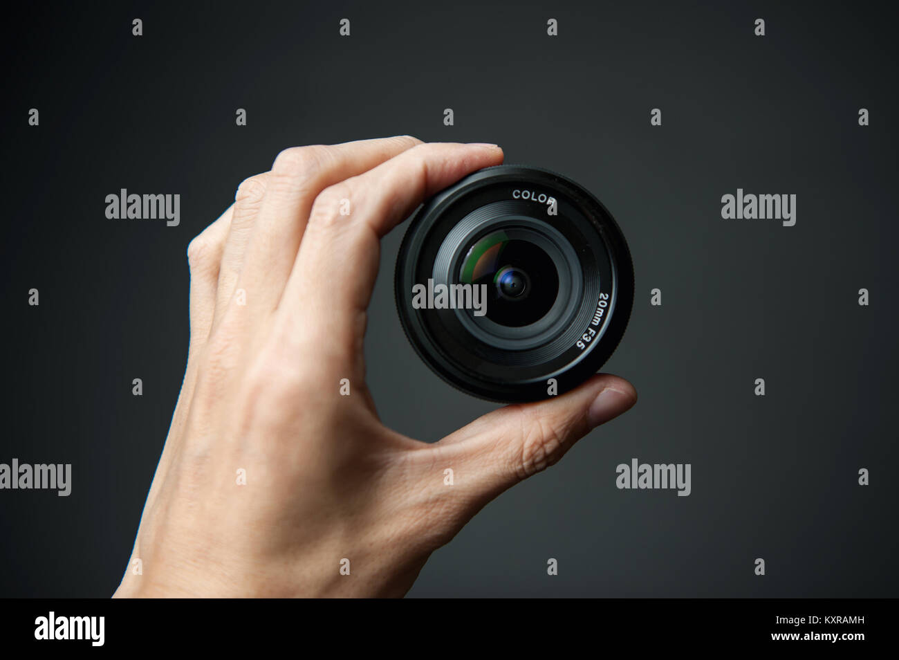 Hand holding lens hi-res stock photography and images - Alamy