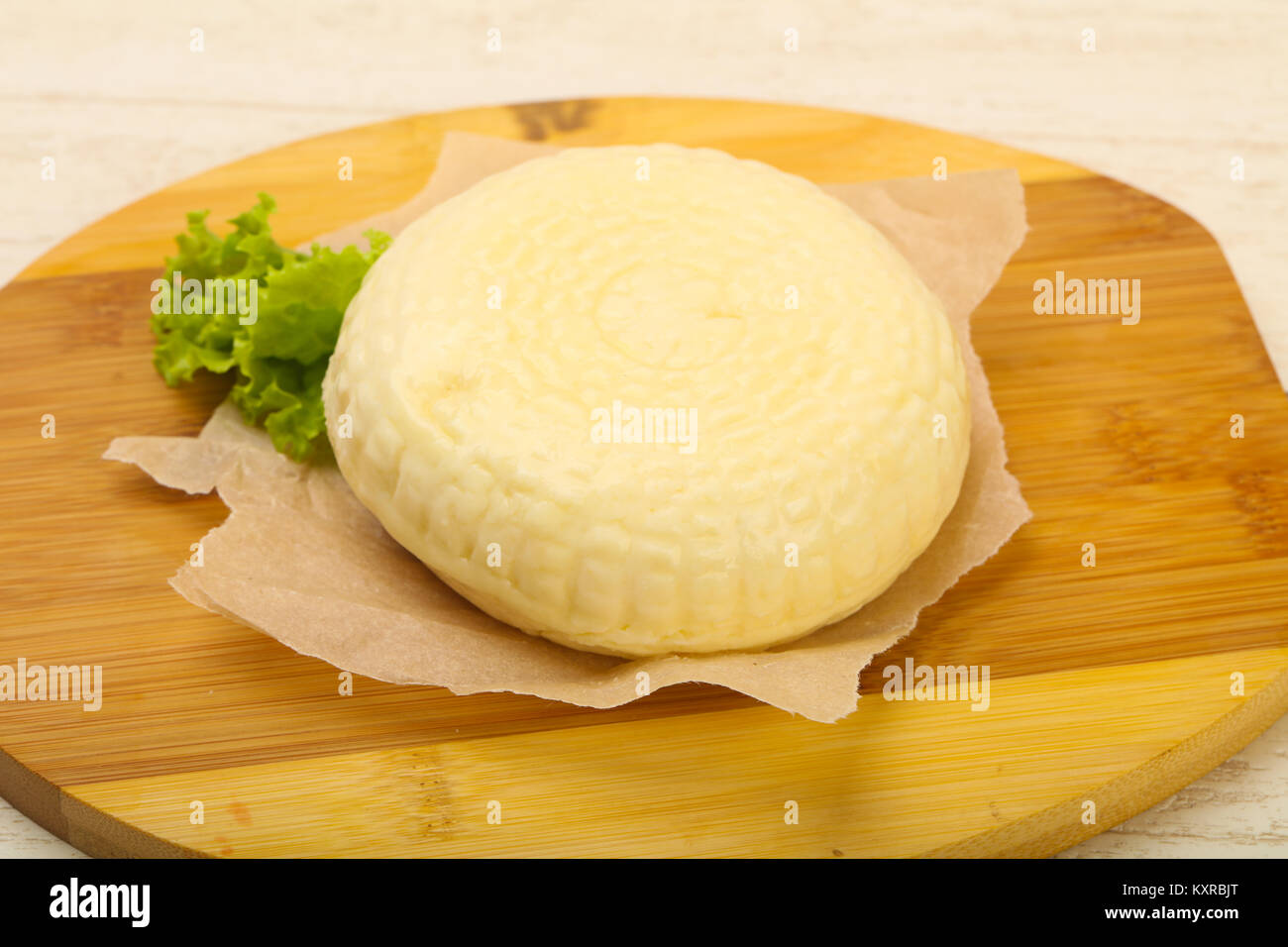 Young caucasian cheese Suluguni Stock Photo - Alamy