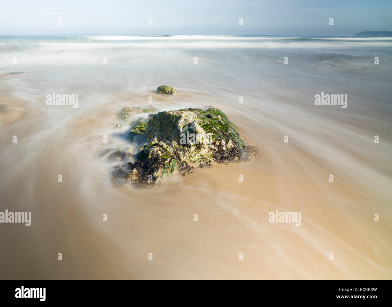 Rock in Sea Stock Photo - Alamy
