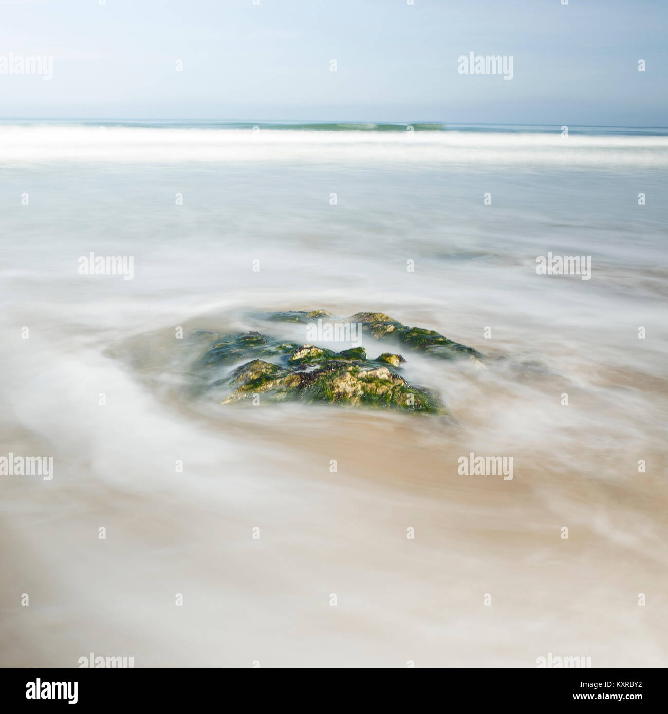 Rock in Sea Stock Photo - Alamy
