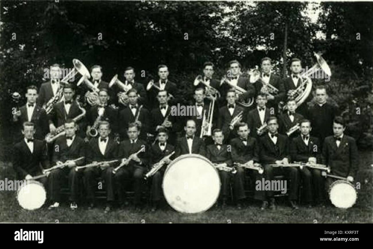 This historical photograph depicts a musical band in Quebec, Canada ...