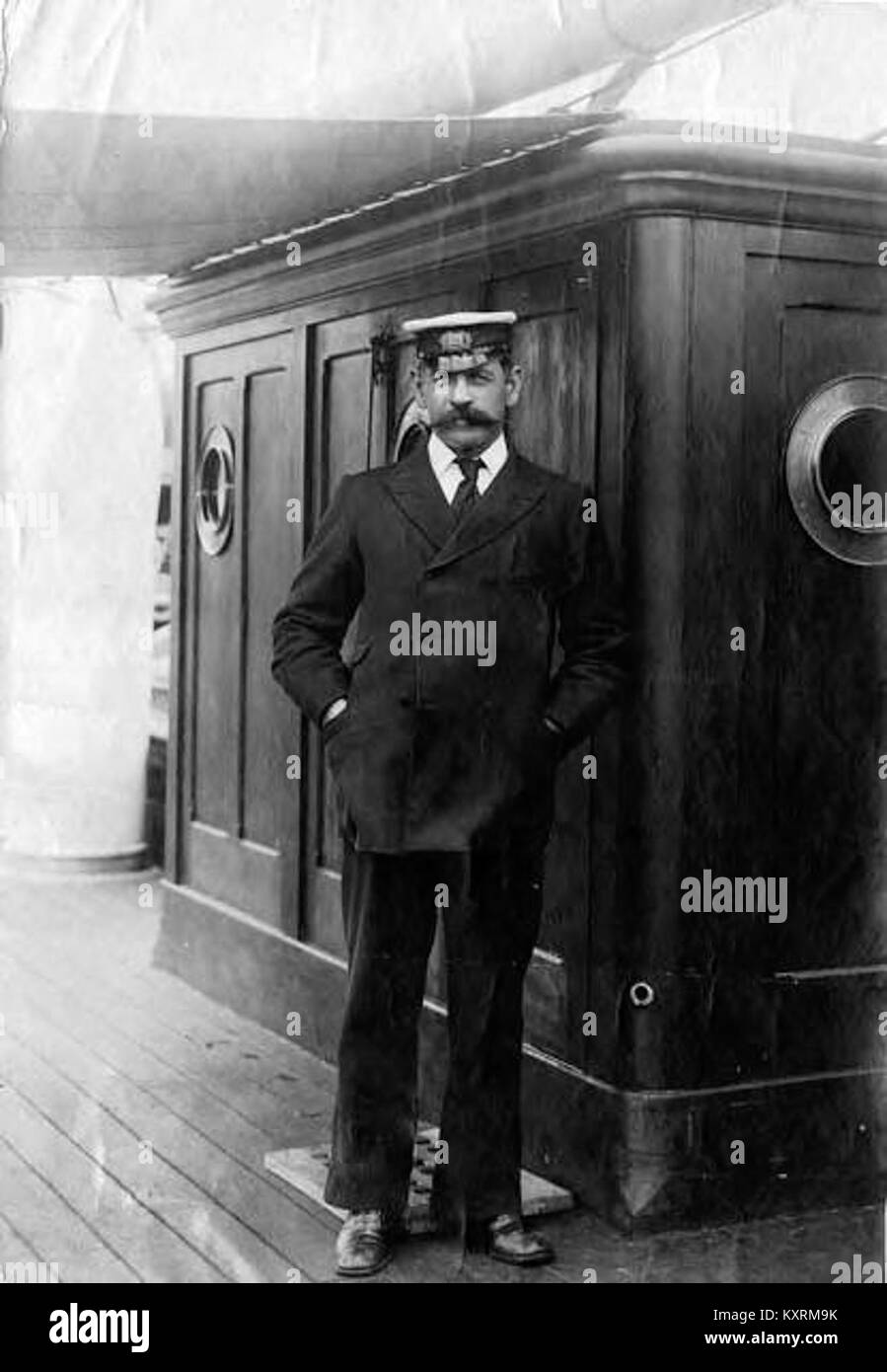 This historical photograph shows the Chief Mate of the four-masted bark ...