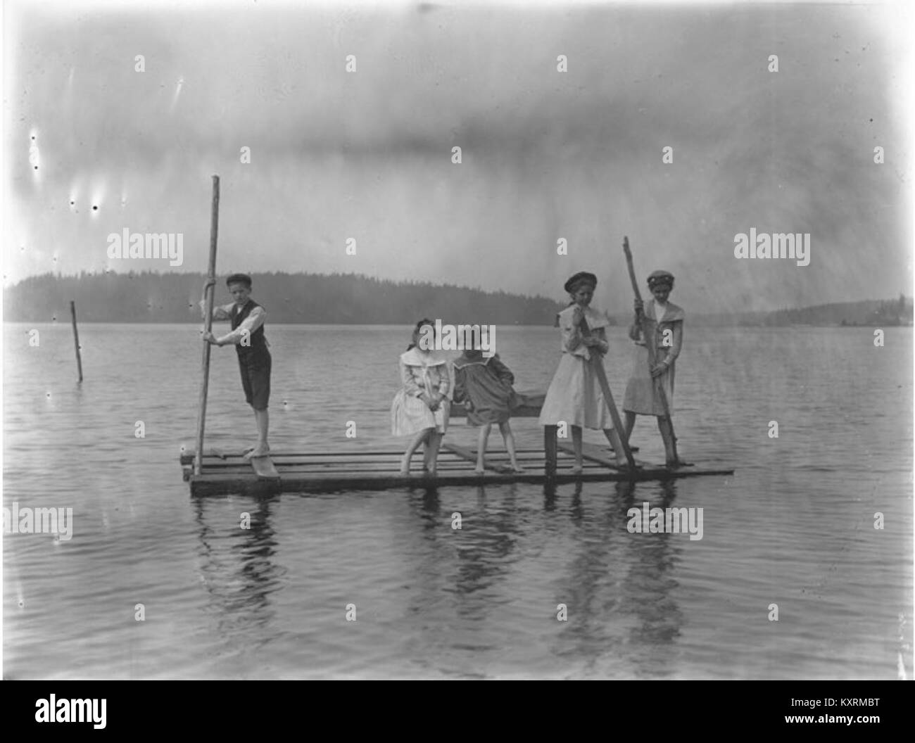 Children on a raft on Lake Washington near Bryn Mawr, Washington, May ...