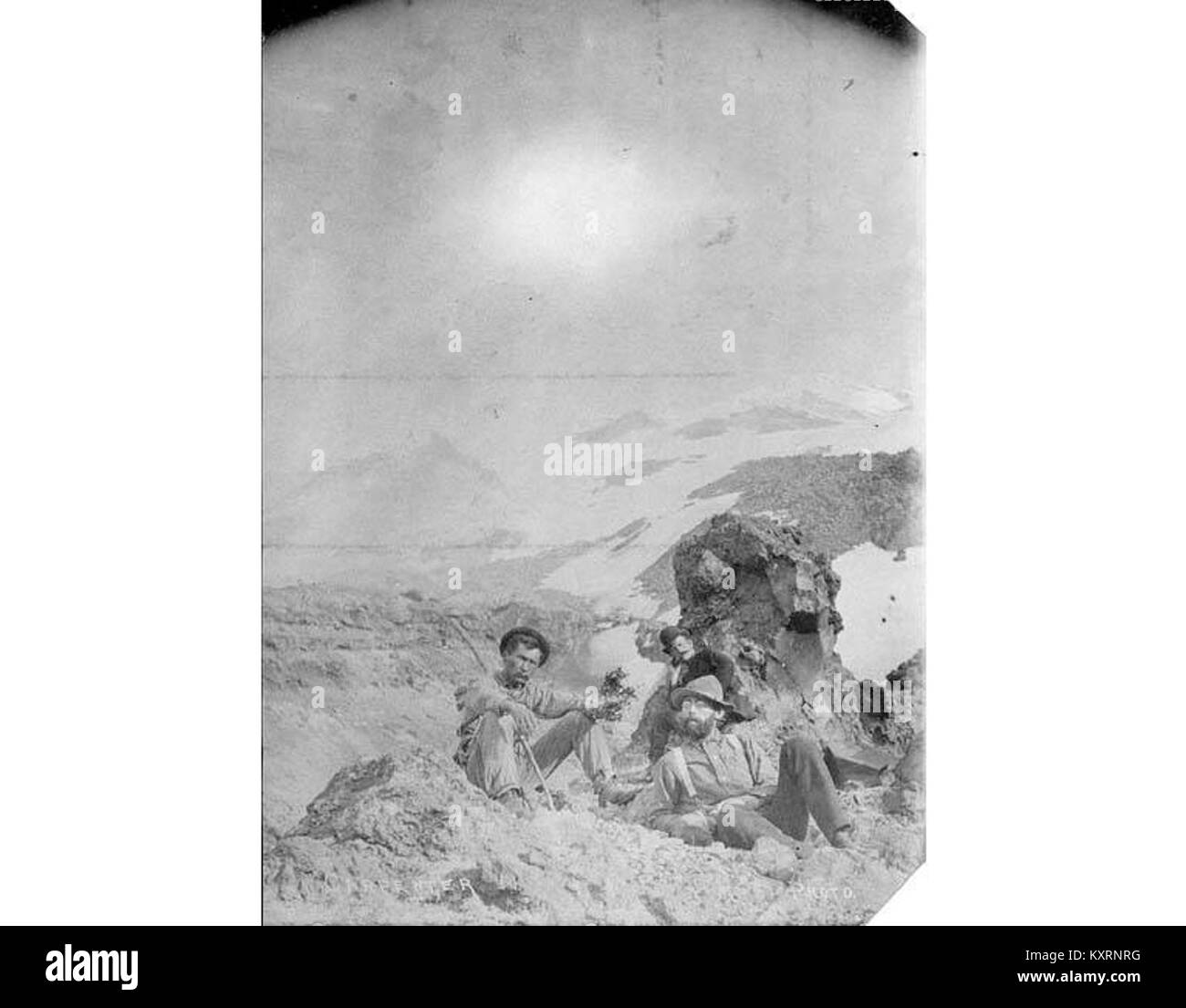 A photograph circa 1895 shows climbers ascending Mount St. Helens, an ...