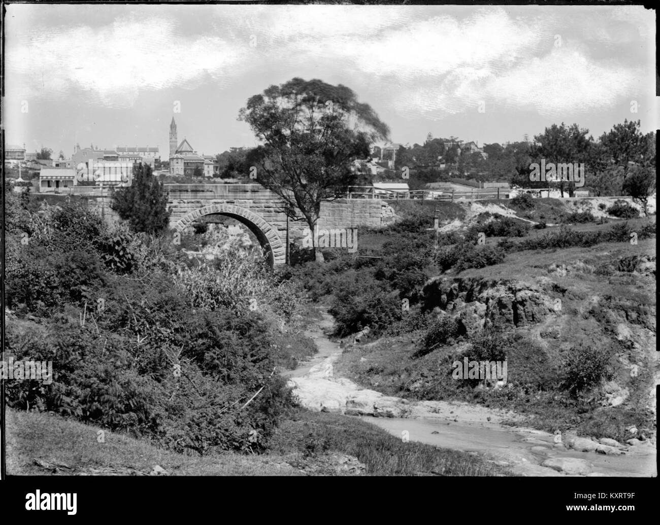 This image depicts a convict-built stone arch bridge, showcasing 19th ...