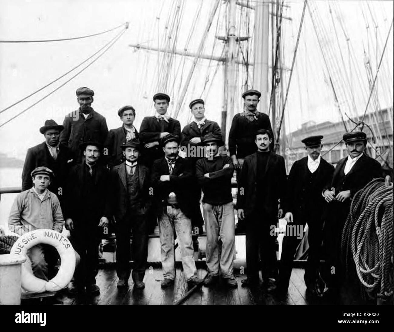 The crew of the French sailing vessel 'DUQUESNE' on deck, photographed ...