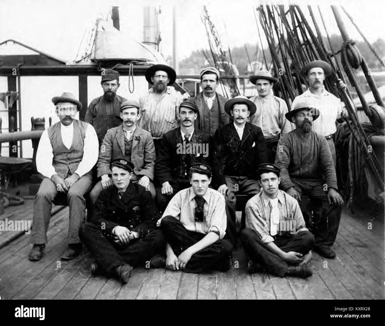 This image from around 1900 shows the crew of the sailing vessel *Earl ...