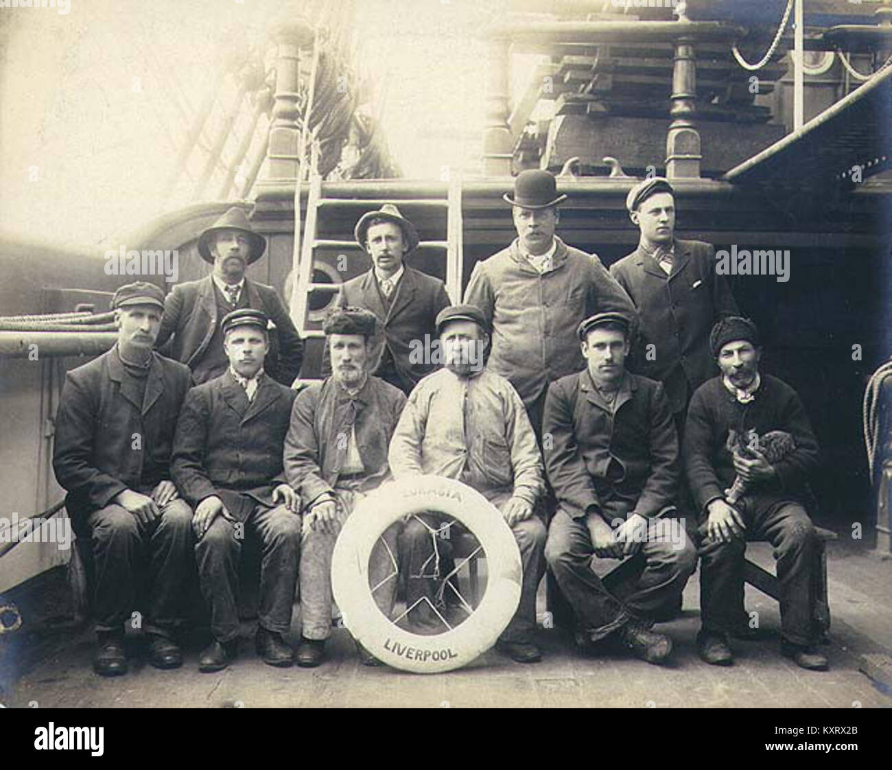 The photograph shows the crew of the bark EURASIA on deck in Puget ...
