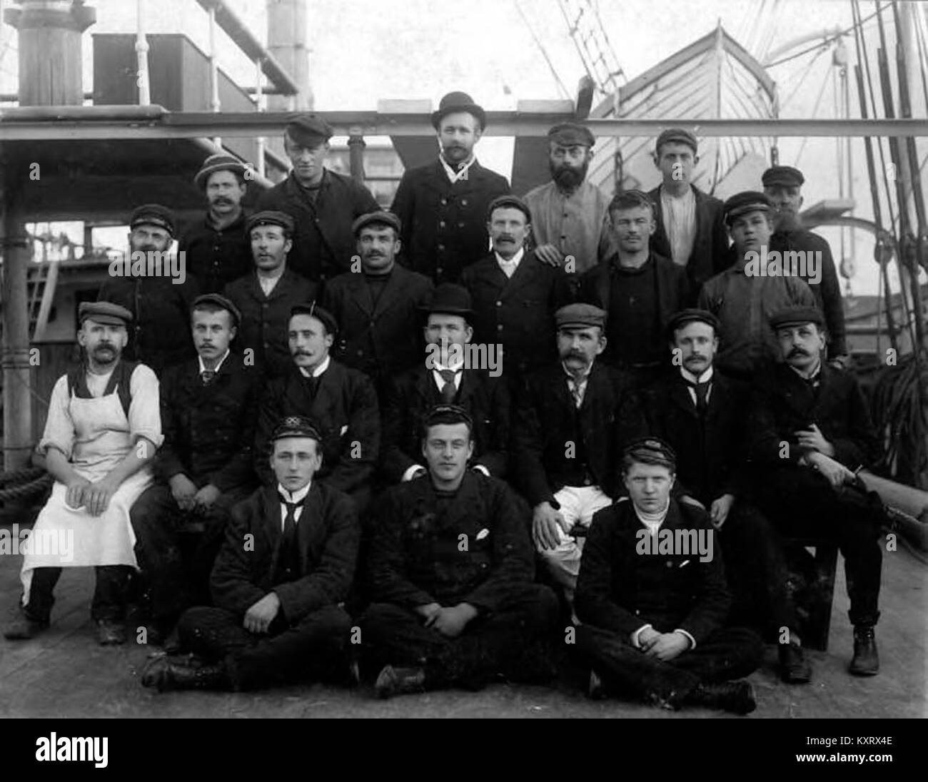 Photograph of the crew on deck of the British four-masted bark Alice A ...