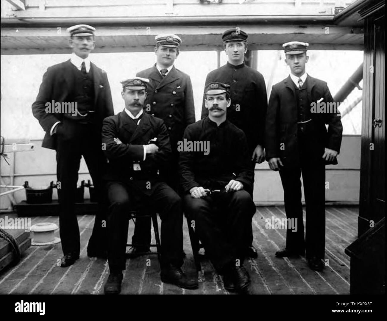 A photograph from around 1900 showing the crew aboard an unidentified ...