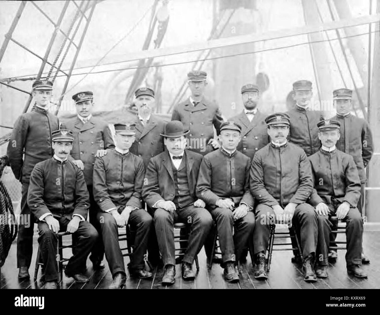 A photograph from around 1900 showing a crew aboard a United States ...