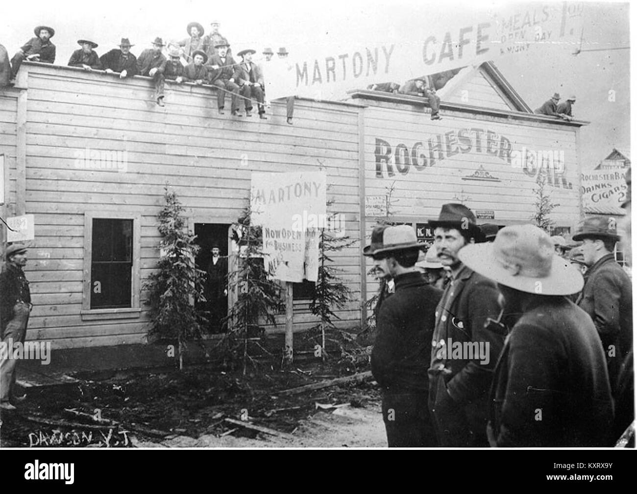Crowd gathered for the opening of the Martony Café, Dawson, Yukon ...