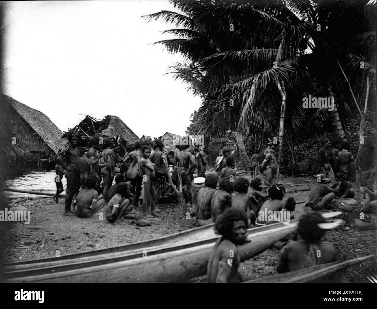 A historical photograph showing a group of Papuans near Asé at Lake ...