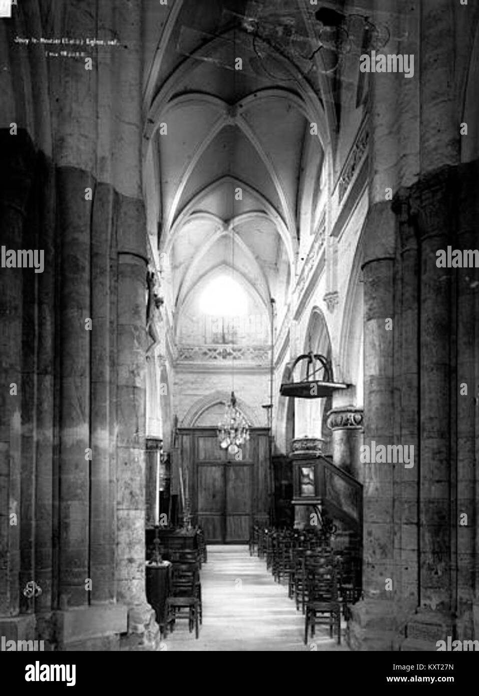 An interior photograph of the nave and choir of the church in Jouy-le ...