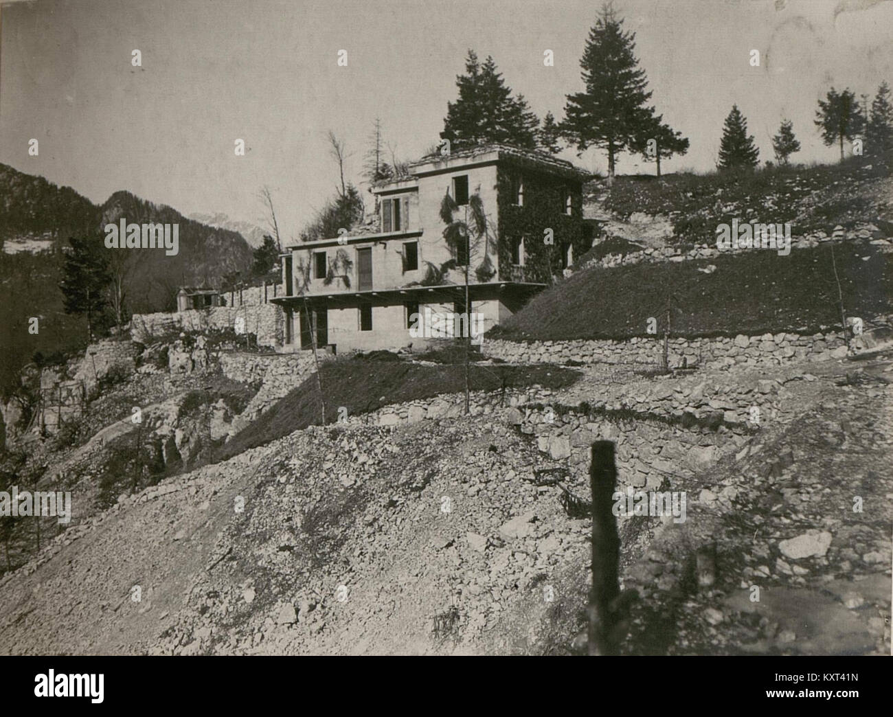 A photograph shows an artillery group command building under ...