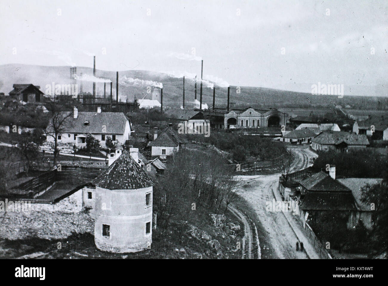 A historical image showing a factory in Hungary, with a focus on the ...