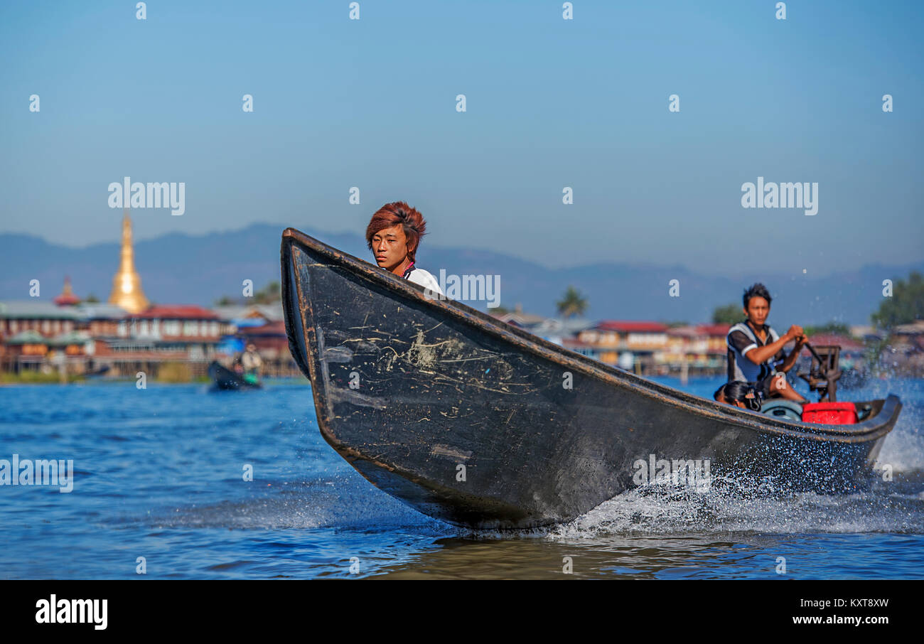 Village people taking boat ride to local market in Inle lake, Myanmar ...