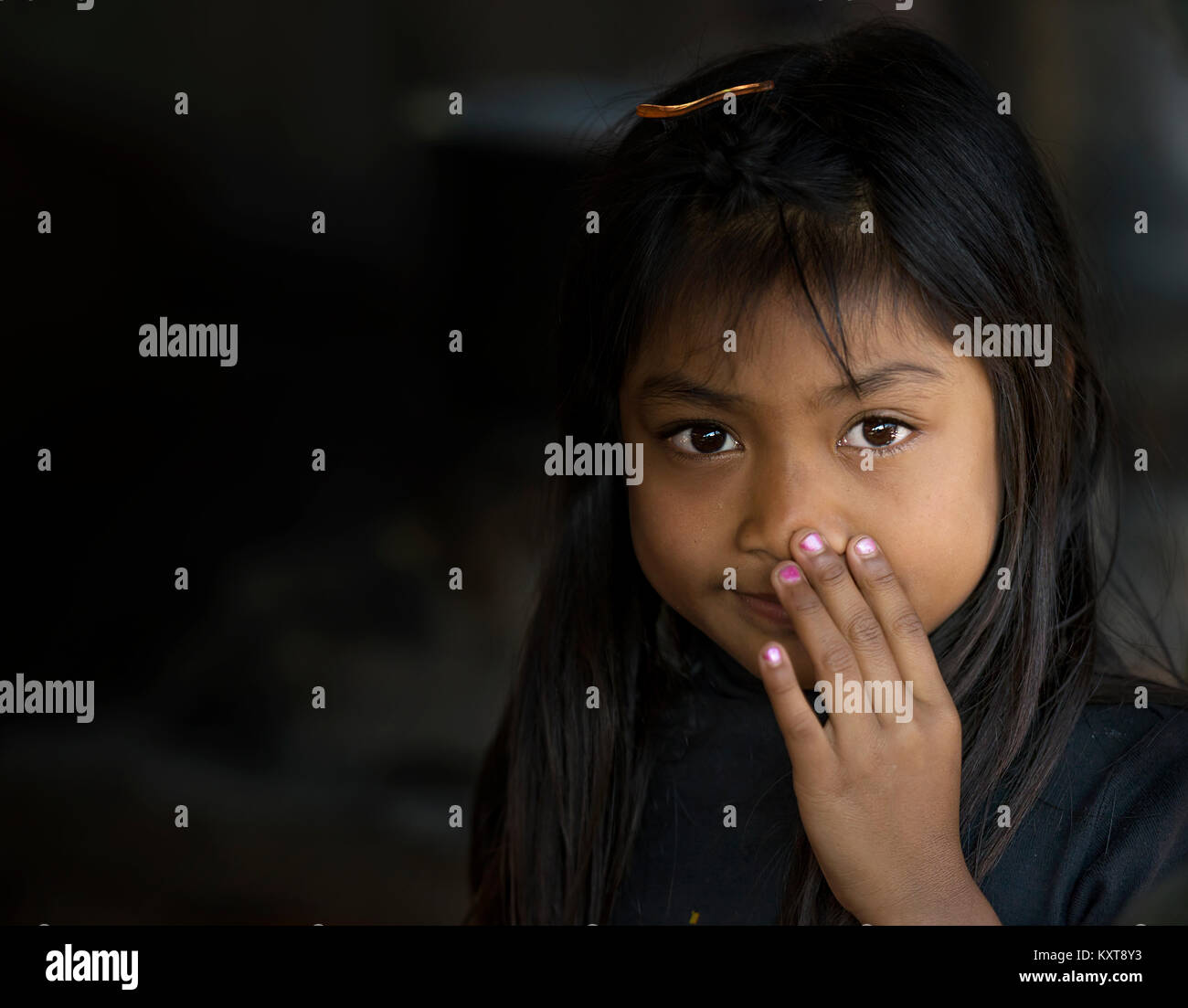 Portrait of shy little girl with beautiful eyes, Inle, Myanmar Stock ...