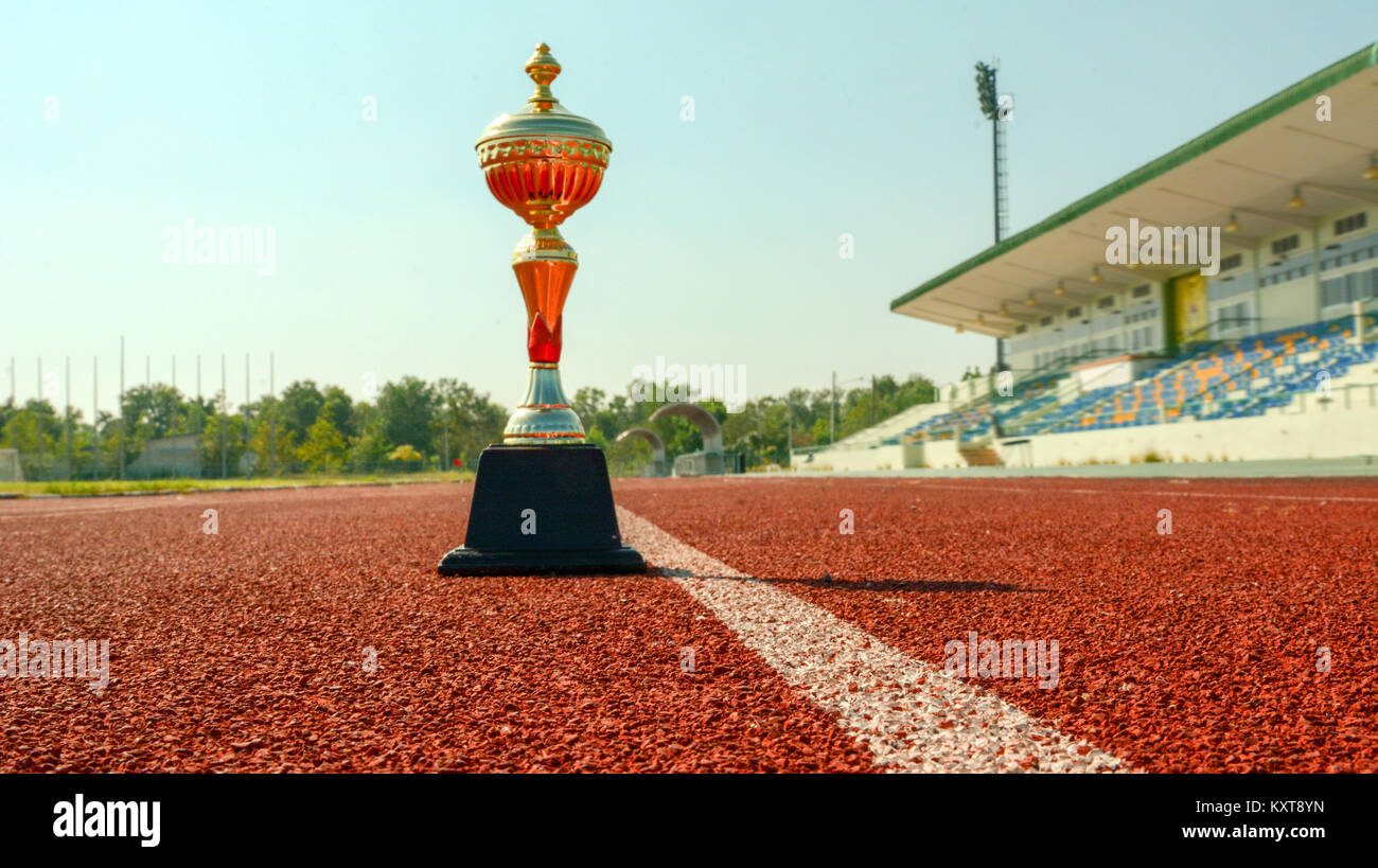 gold cup winner, track running Stock Photo - Alamy