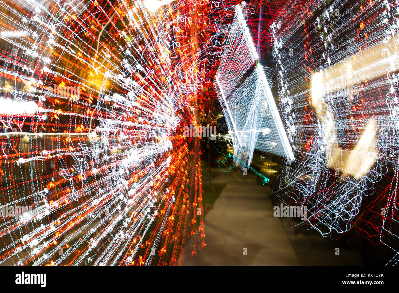 Night city lights diffused with camera motion and zoom out on long ...