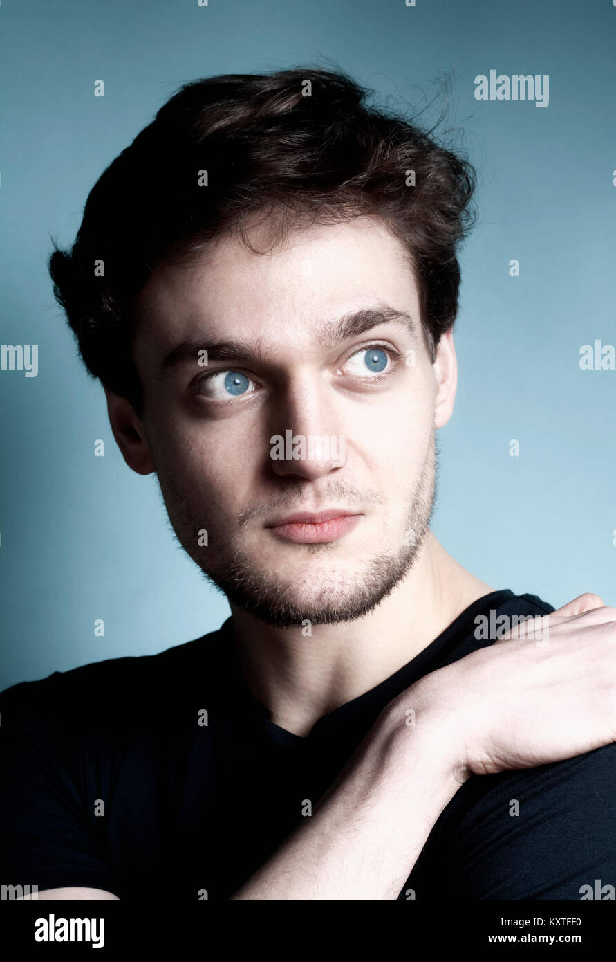 Portrait of a Young Man with Blue Eyes Stock Photo - Alamy