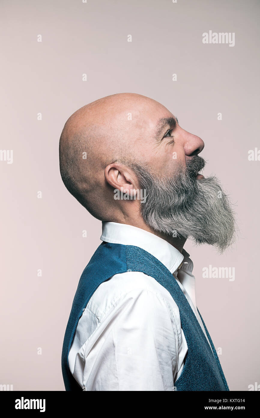 middle-aged man with beard, studio portrait Stock Photo - Alamy