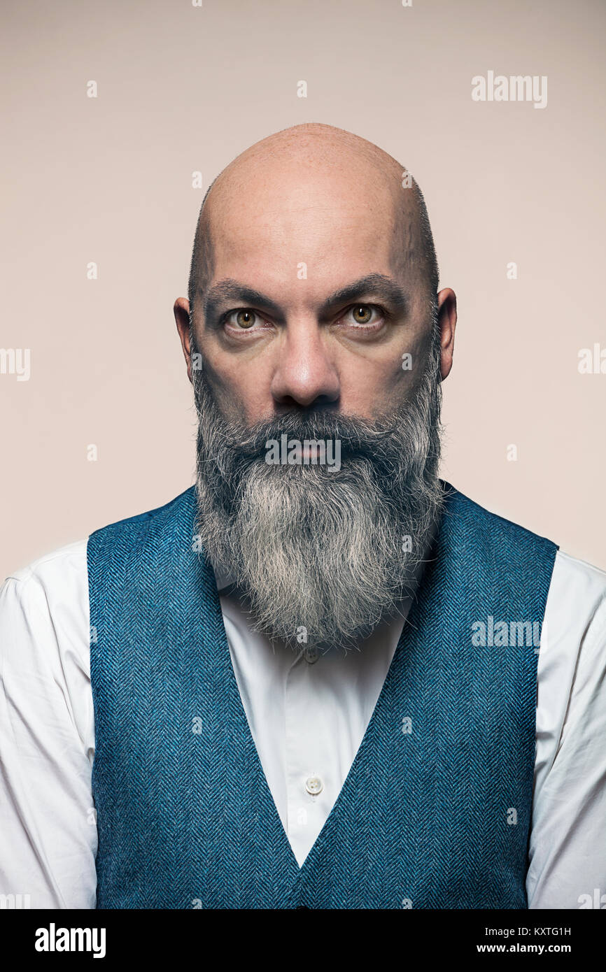 middle-aged man with beard, studio portrait Stock Photo - Alamy
