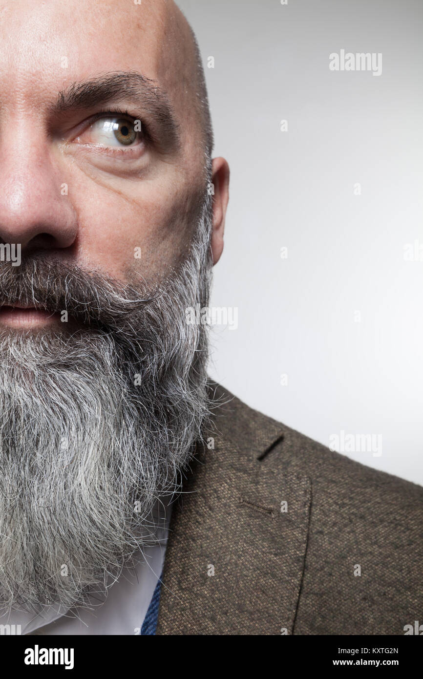 Closeup of a bald man with long beard, half face Stock Photo - Alamy