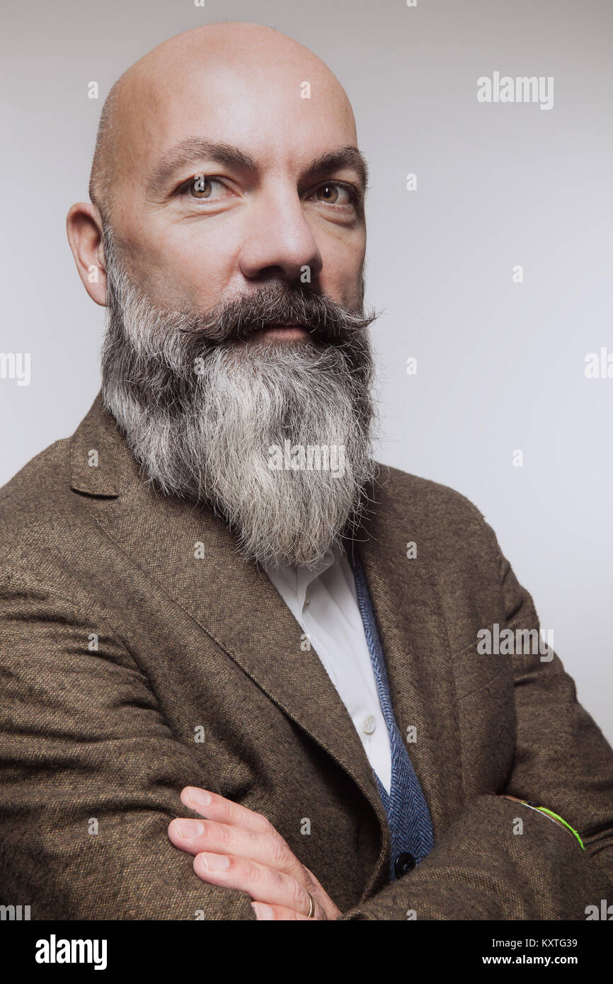 middle-aged man with beard, studio portrait Stock Photo - Alamy
