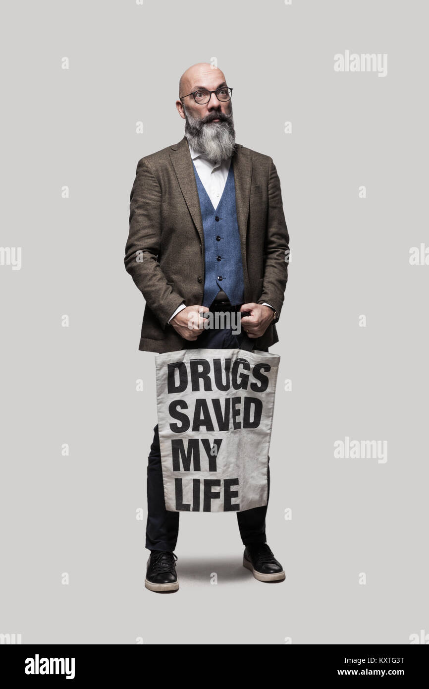 man shows poster with a slogan, isolated on gray background Stock Photo ...