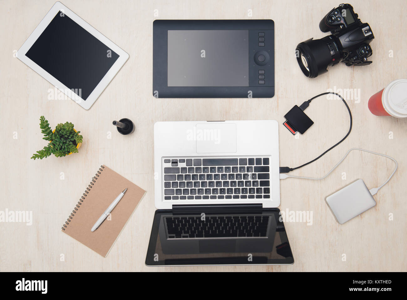 Top view laptop and camera workspace of photographer Stock Photo - Alamy