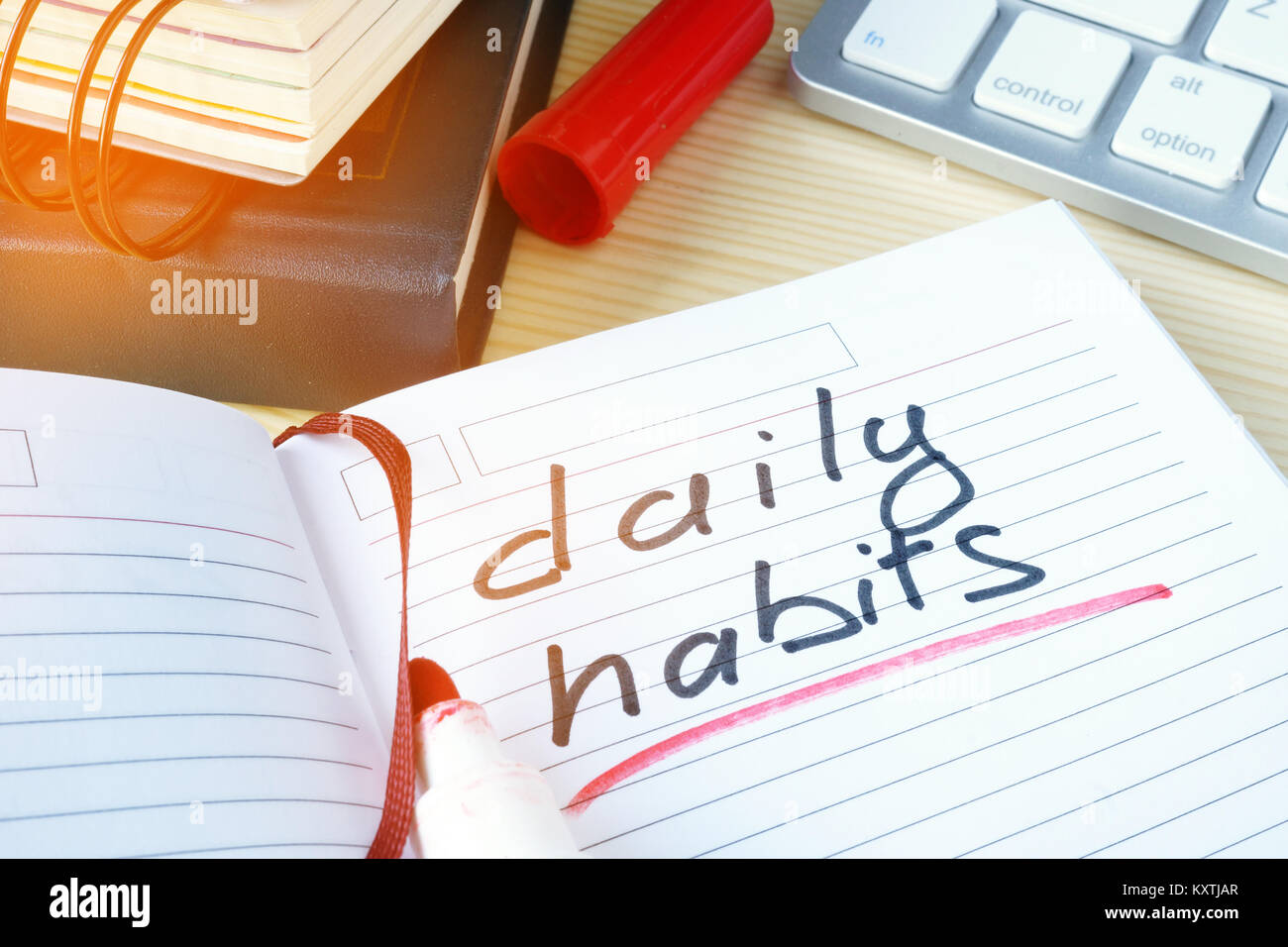 Daily habits written in a note Stock Photo - Alamy